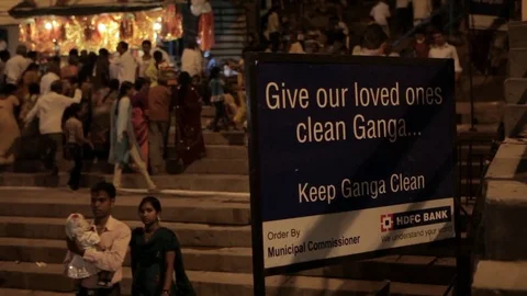 WS Ghats on river Ganges with sign in fo... | Stock Video | Pond5
