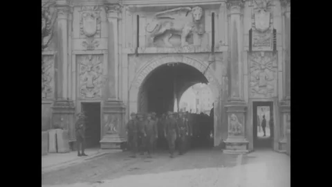 WW1 - US trooper walk through archway | Stock Video | Pond5