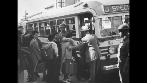 WW2 1942 - Japanese enter bus in USA bec... | Stock Video | Pond5
