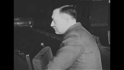 WW2 - Adolf Hitler sit in room on a chai... | Stock Video | Pond5