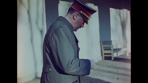 WW2 - Adolf Hitler in uniform stand on t... | Stock Video | Pond5