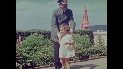 WW2 - Adolf Hitler walk with girl on ter... | Stock Video | Pond5