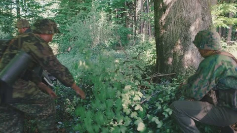 WW2 – German Soldiers hiding vehicle i... | Stock Video | Pond5