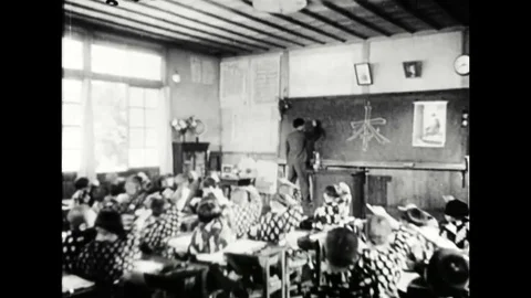 WW2 Japan - Childs sit in a classroom | Stock Video | Pond5