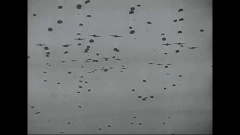 WW2 - Paratrooper jump out of aircraft | Stock Video | Pond5