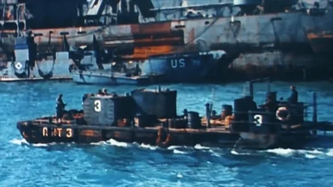 WW2 - Small US military ship drives in h... | Stock Video | Pond5