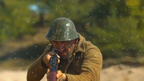 WW2 soldier pointing gun, slow motion | Stock Video | Pond5