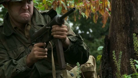 WW2 U.S. Army G.I. Soldier in Woods with... | Stock Video | Pond5