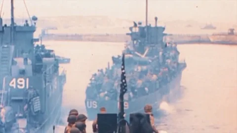 WW2 - US landing crafts leave harbor | Stock Video | Pond5