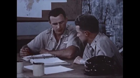 WW2 - US soldiers talk together in headq... | Stock Video | Pond5