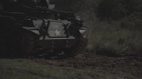WW2 U.S. Tank rolling into Combat on dir... | Stock Video | Pond5