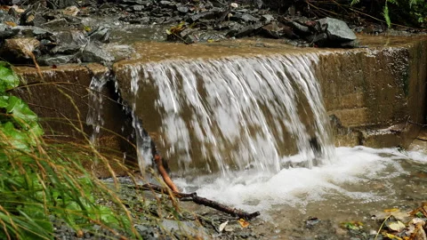 Wwater that spills over a parapet during... | Stock Video | Pond5