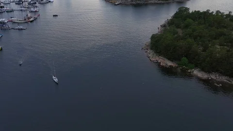Yacht & tall mast boat floating on Sandh... | Stock Video | Pond5