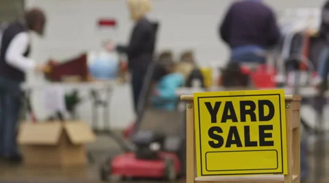 Yard Sale sign with people in background | Stock Video | Pond5
