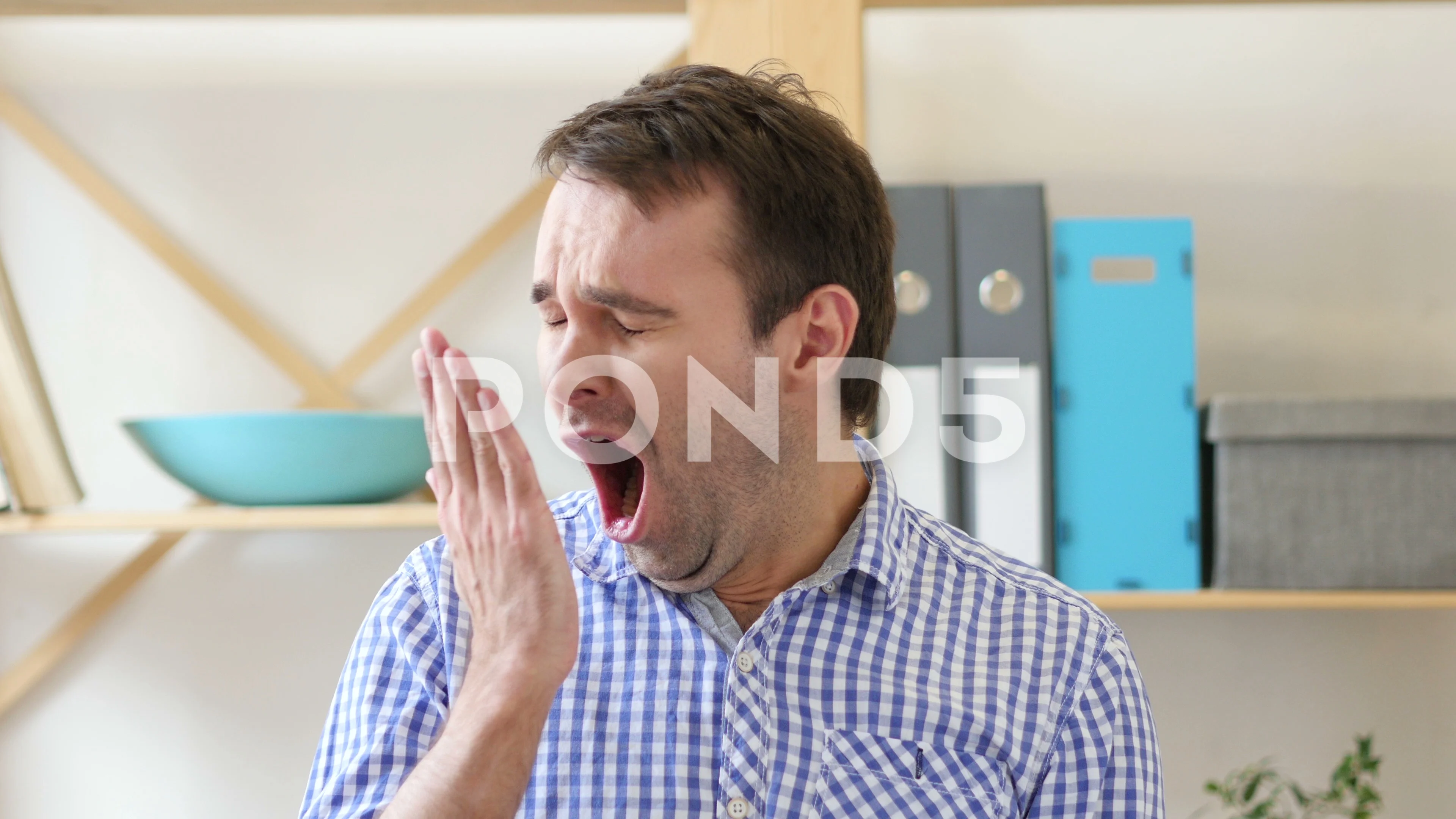 Guy Yawning