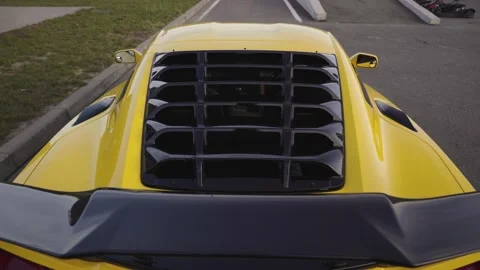 Yellow Chevrolet Corvette C7. Back view | Stock Video | Pond5