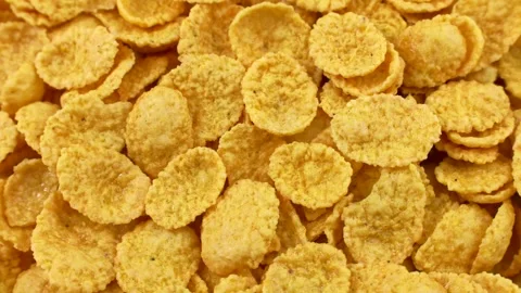Yellow corn flakes texture circle rotati... | Stock Video | Pond5