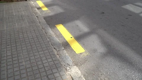 Yellow dashed line on the asphalt road. ... | Stock Video | Pond5