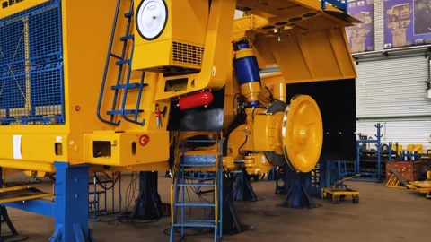 Yellow dump truck cabin in the assembly ... | Stock Video | Pond5