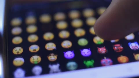yellow emoticon scrolling on the phone. ... | Stock Video | Pond5