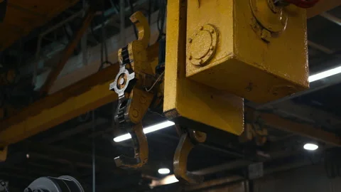 A Yellow Hook of the Huge Crane is Used ... | Stock Video | Pond5