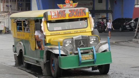 Yellow jeepney waiting for passengers,Ma... | Stock Video | Pond5