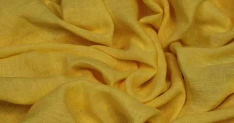 Yellow linen fabric cloth waves backgrou... | Stock Video | Pond5