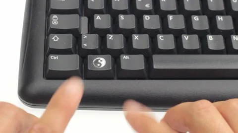 the yin yang key on a computer keyboard,... | Stock Video | Pond5
