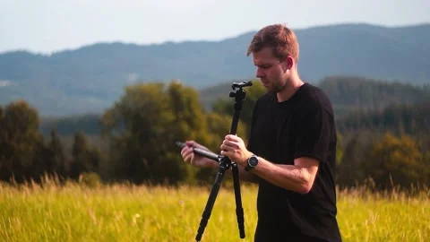 young adventurous photographer assemblin... | Stock Video | Pond5