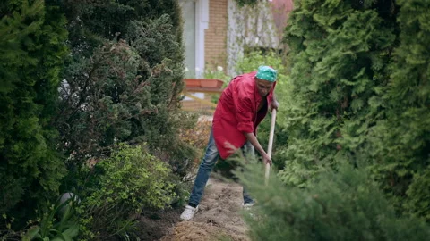 Young African American man digging groun... | Stock Video | Pond5