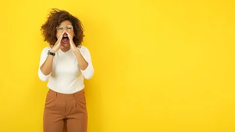 Young african american woman shouting ha... | Stock Video | Pond5