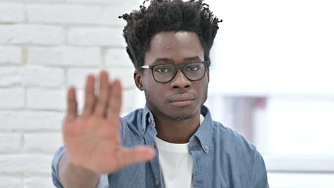 Young African Man saying No with Hand Si... | Stock Video | Pond5