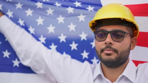 Young American worker in a safety helmet... | Stock Video | Pond5