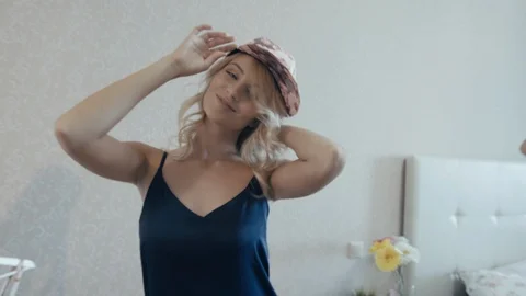 Young and beautiful girls have fun tryin... | Stock Video | Pond5