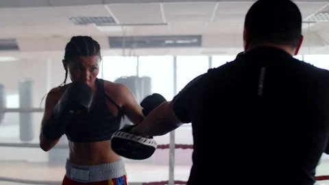 Young asian female boxer with braided ha... | Stock Video | Pond5