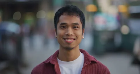 Young Asian Filipino man smile face port... | Stock Video | Pond5