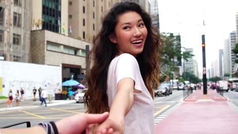 Young Asian Girl Lead by the Hand of Her... | Stock Video | Pond5