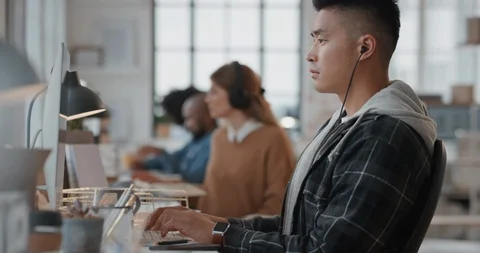 young asian man software developer using... | Stock Video | Pond5