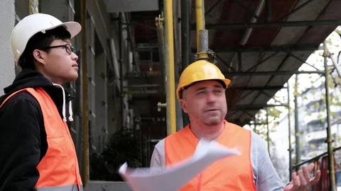 Young Asian trainee engineer at work on ... | Stock Video | Pond5