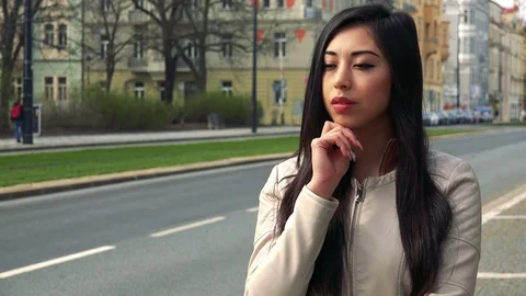 A young Asian woman broods over somethin... | Stock Video | Pond5