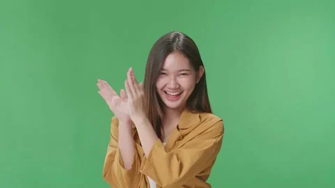 Young Asian Woman Clapping Her Hands In ... | Stock Video | Pond5
