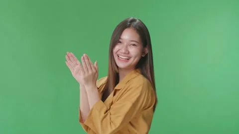 Young Asian Woman Clapping Her Hands In ... | Stock Video | Pond5