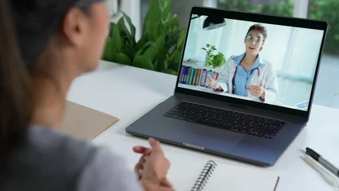 Young Asian woman have video call with d... | Stock Video | Pond5