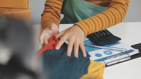 Young Asian women show off the clothes c... | Stock Video | Pond5