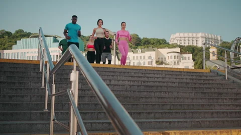 Young athletes run down stairs training ... | Stock Video | Pond5