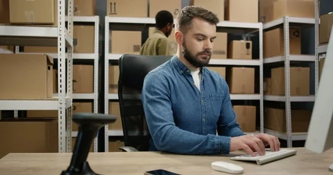 Young attractive Caucasian postman sitti... | Stock Video | Pond5