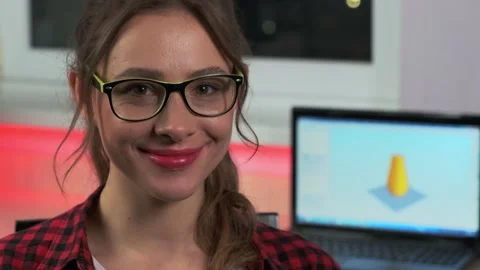 Young attractive tech girl smiles at the... | Stock Video | Pond5