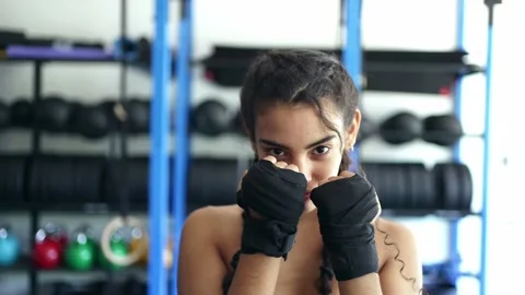 Young beautiful fit woman with boxing ta... | Stock Video | Pond5