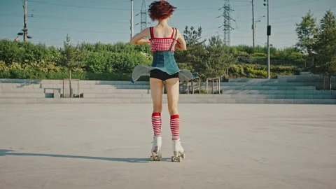 Young beautiful lady in classic roller s... | Stock Video | Pond5