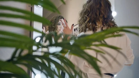 Young beautiful woman with beautiful wav... | Stock Video | Pond5